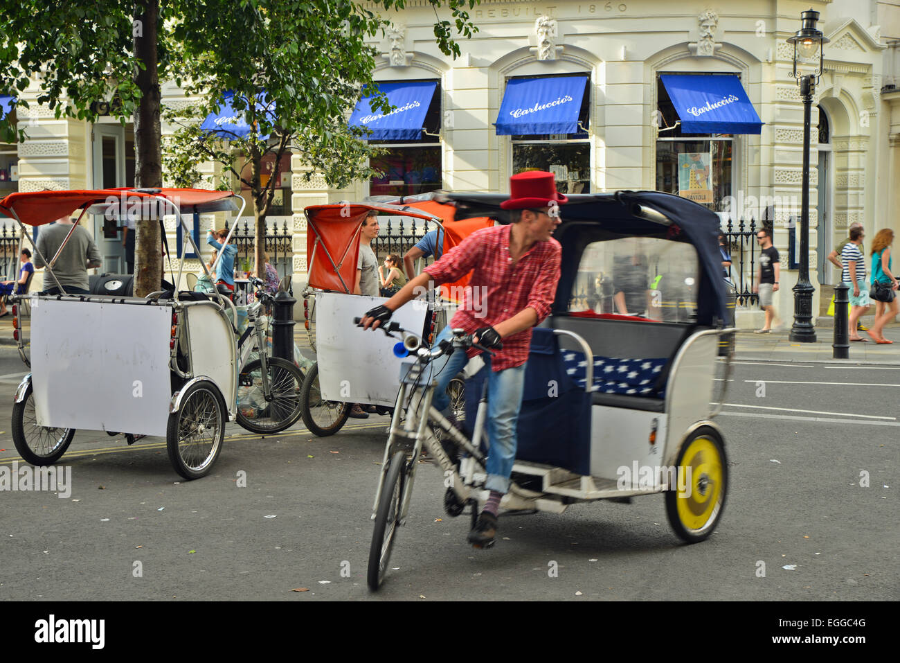 Man riding Rickshaw in London Street Stock Photo - Alamy