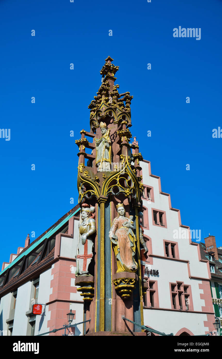 Column decorated with figures and religious statues Stock Photo - Alamy