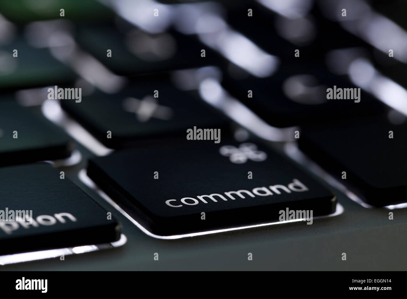 Illuminated Apple Macbook Pro keyboard command key - USA Stock Photo ...