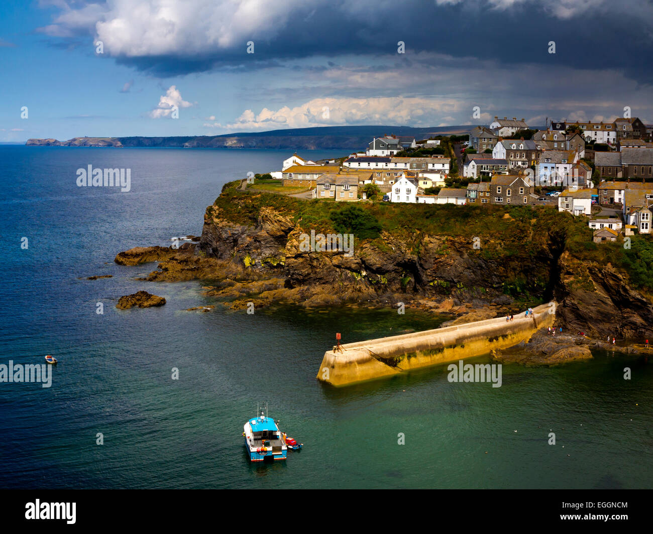 Rain shower over Port Isaac harbour on the Atlantic coast of North ...