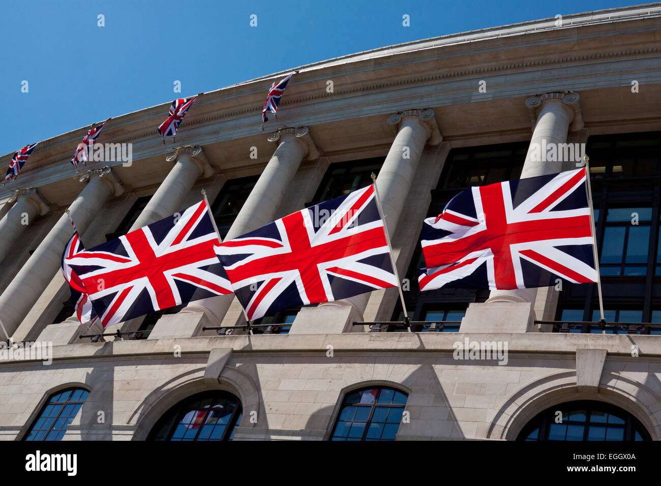 London building decorated with Union Jack flags Stock Photo - Alamy