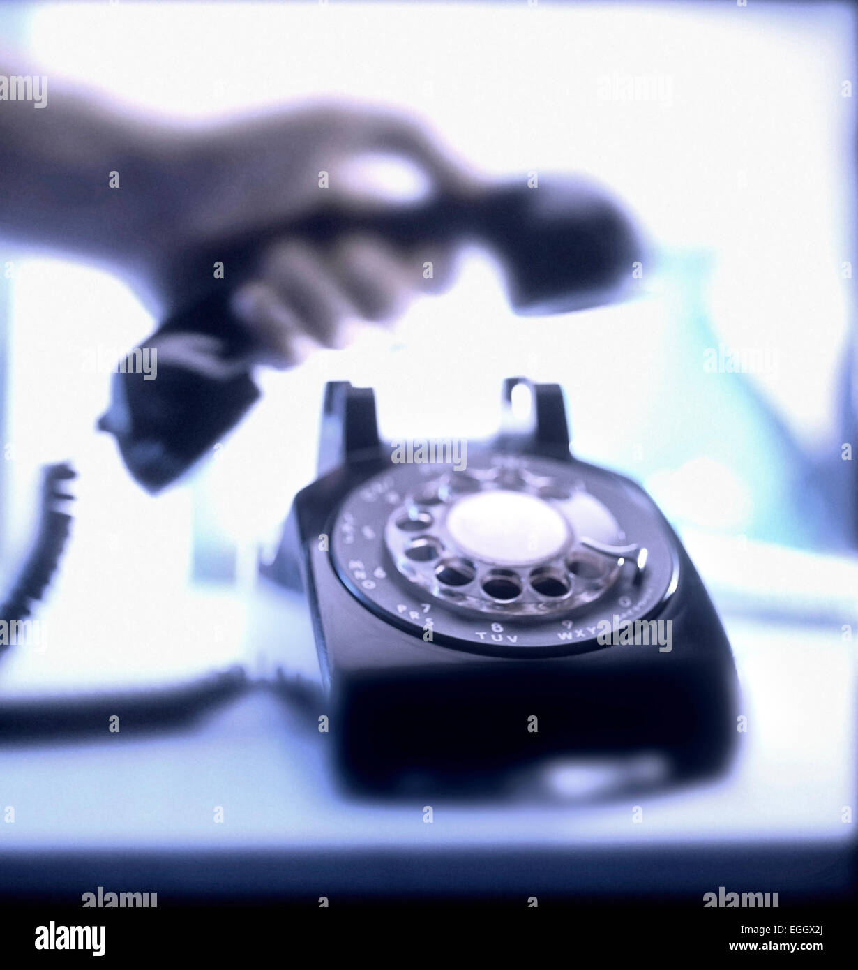 Hand holding telephone Stock Photo - Alamy