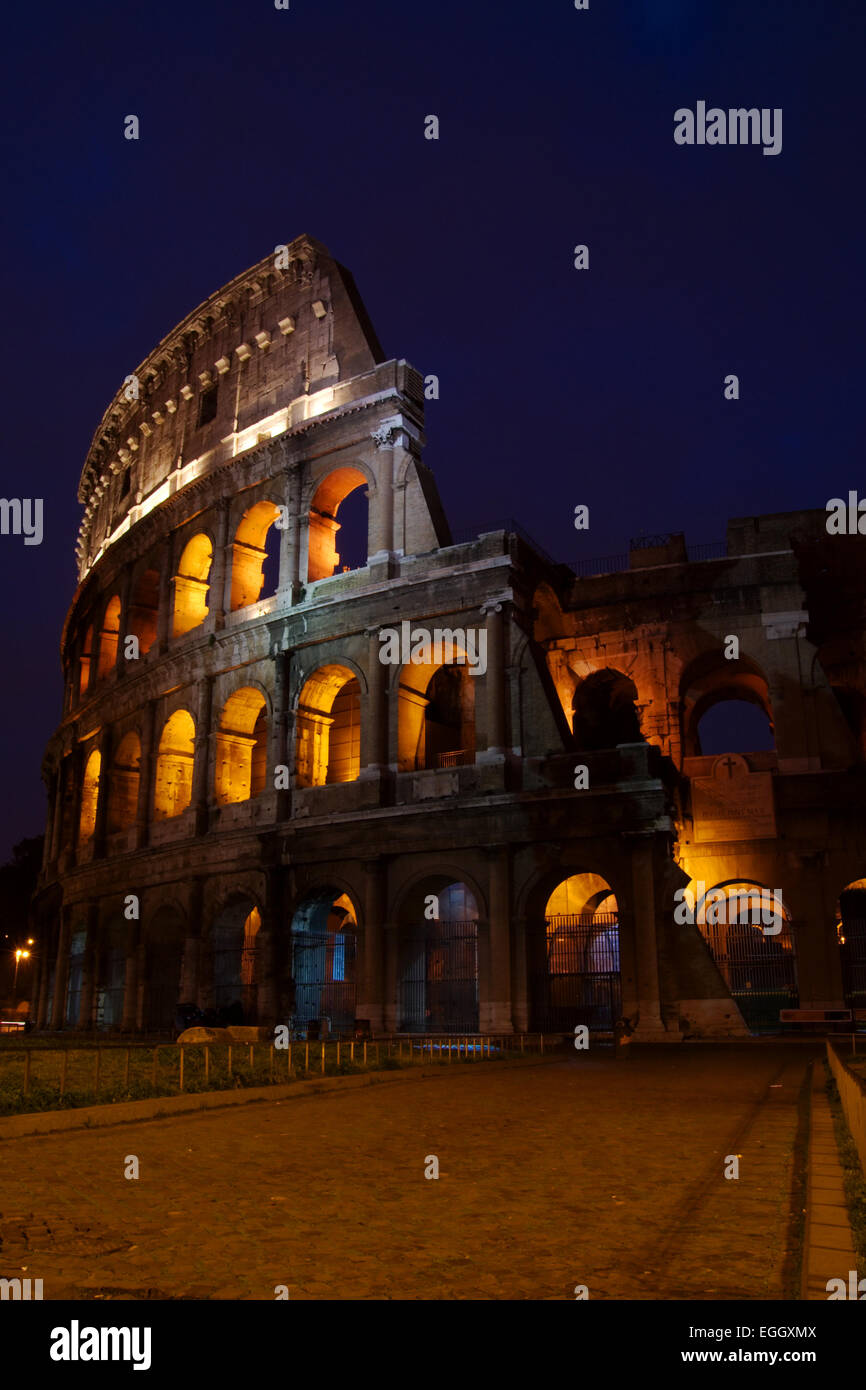 The Roman Coliseum at night. A picture of the great amphitheater just ...