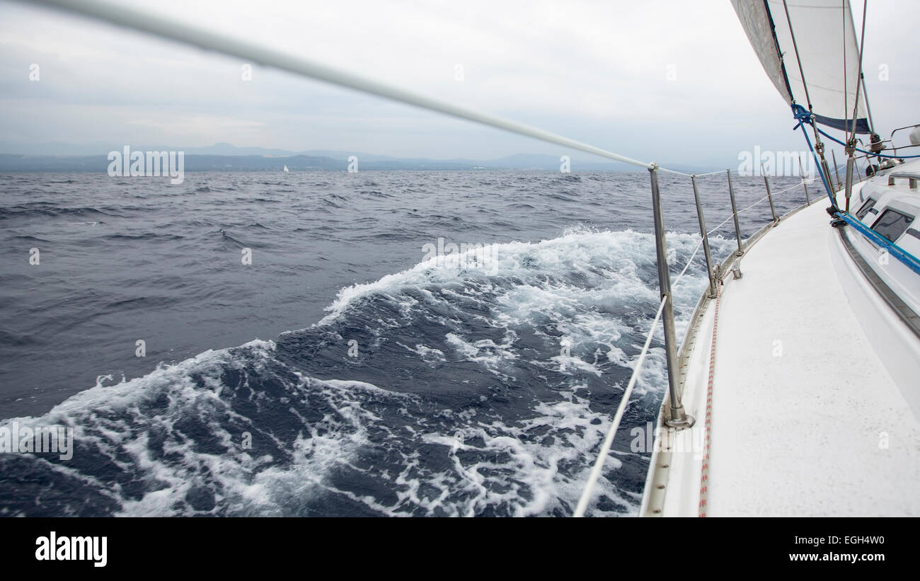 Sailing in the sea during deteriorating weather (cloudy weather ...