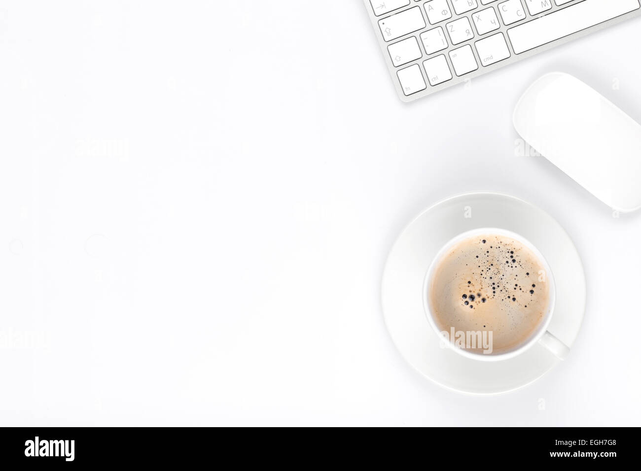 Office desk table with computer and coffee cup. Top view with copy ...