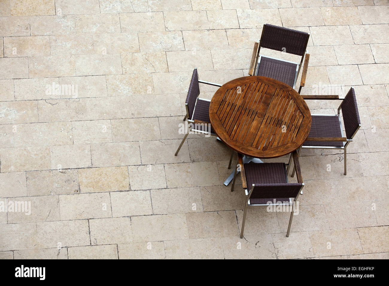 Outdoor summer cafe tables with chairs. View from above. Copy space ...