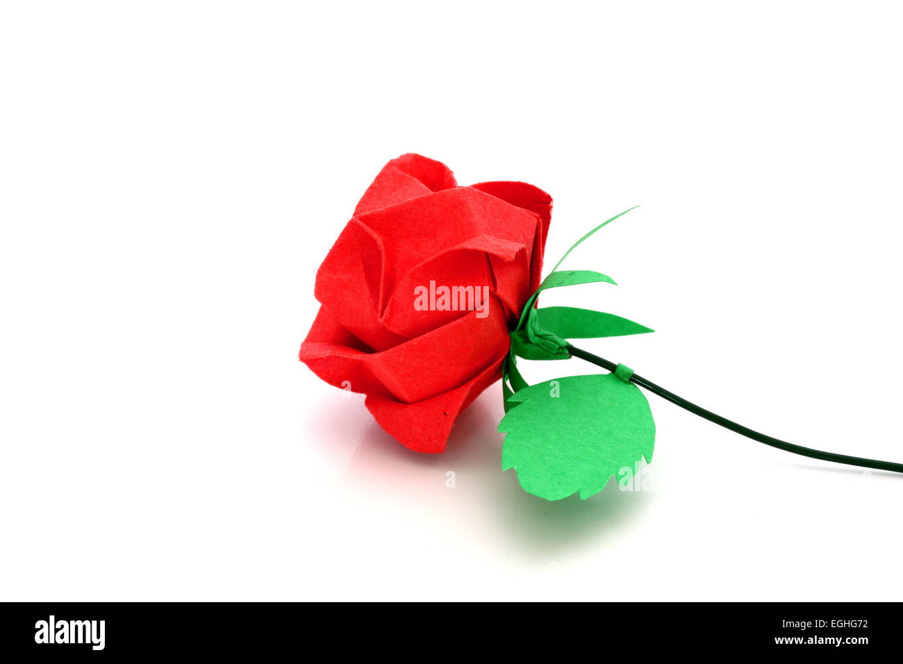 red rose origami over white background Stock Photo - Alamy