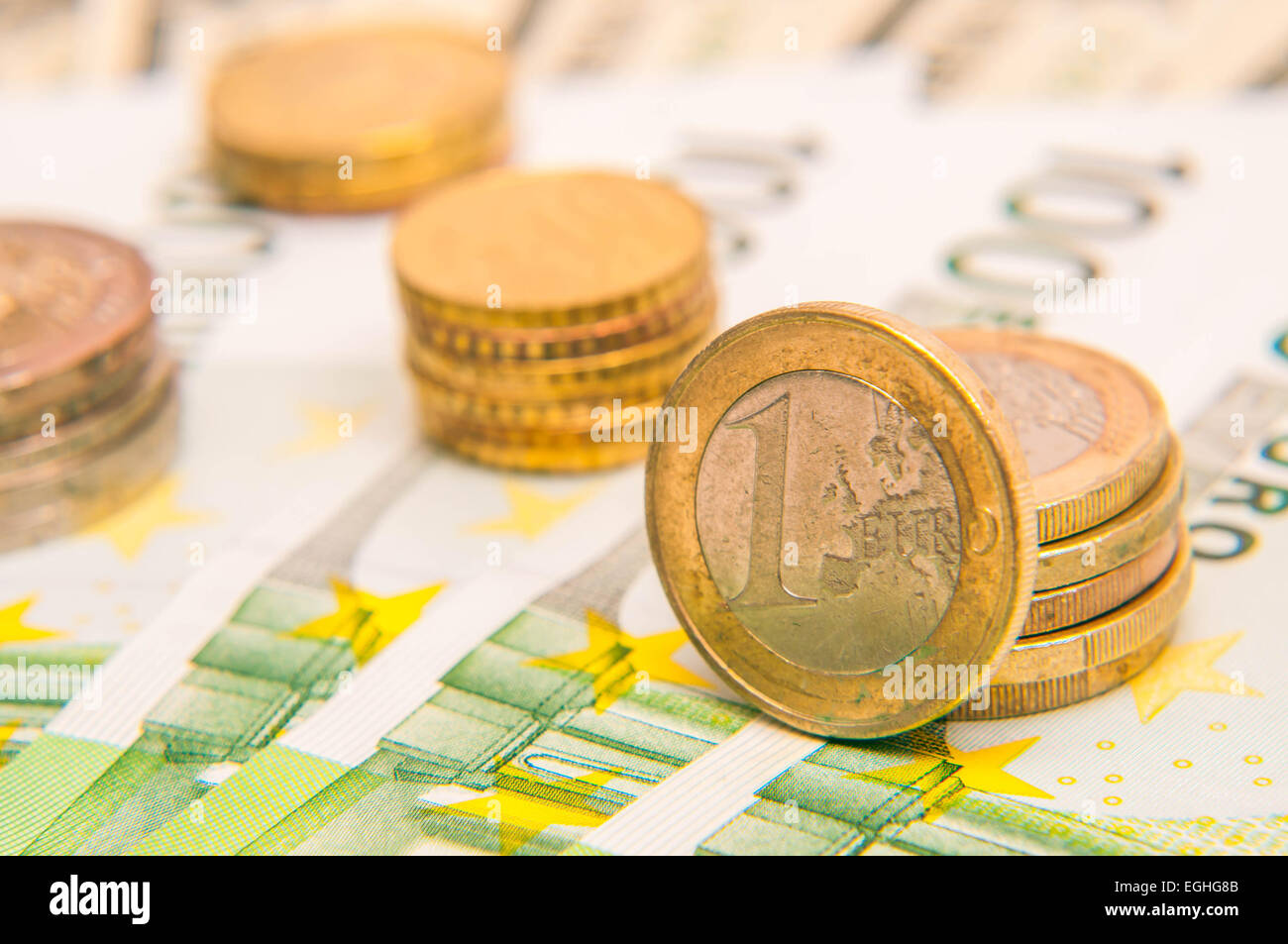 a tower of Euro coins, banknote, European currency Stock Photo - Alamy