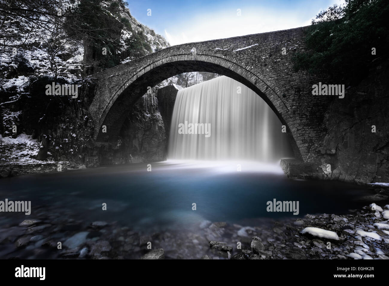 Waterfall under stone bridge hi-res stock photography and images - Alamy