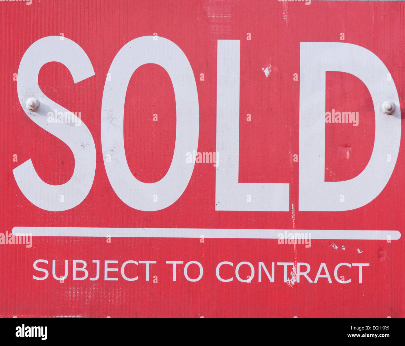 Sold Subject to Contract sign outside house Stock Photo - Alamy