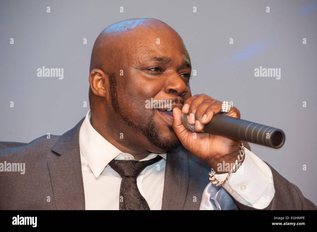 Black African male singer giving a live performance Stock Photo - Alamy