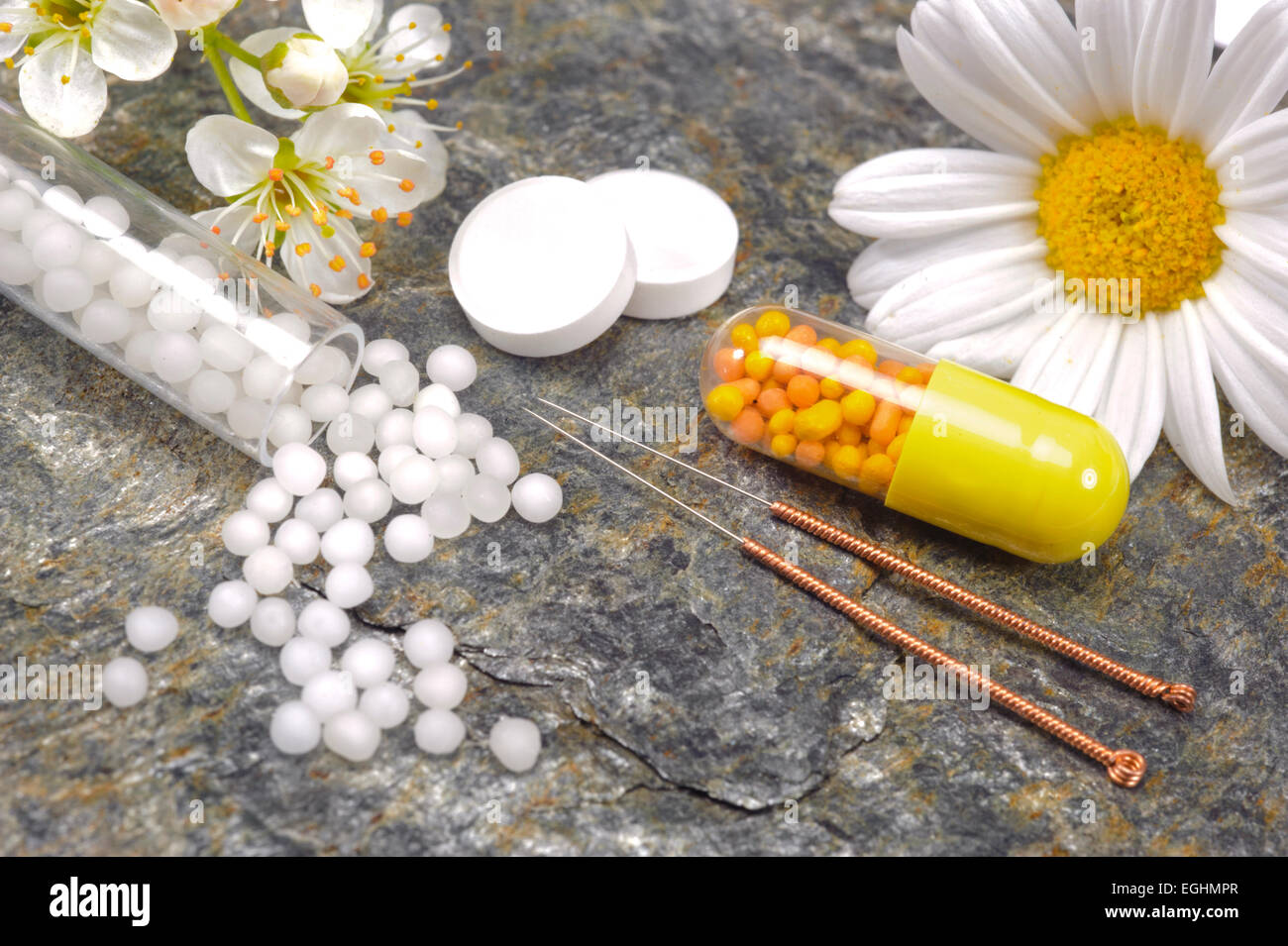 alternative medicine with herbal pills and acupuncture Stock Photo - Alamy