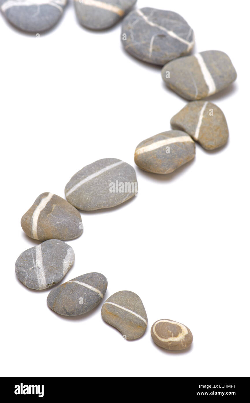 group of stones in line shows the way Stock Photo - Alamy