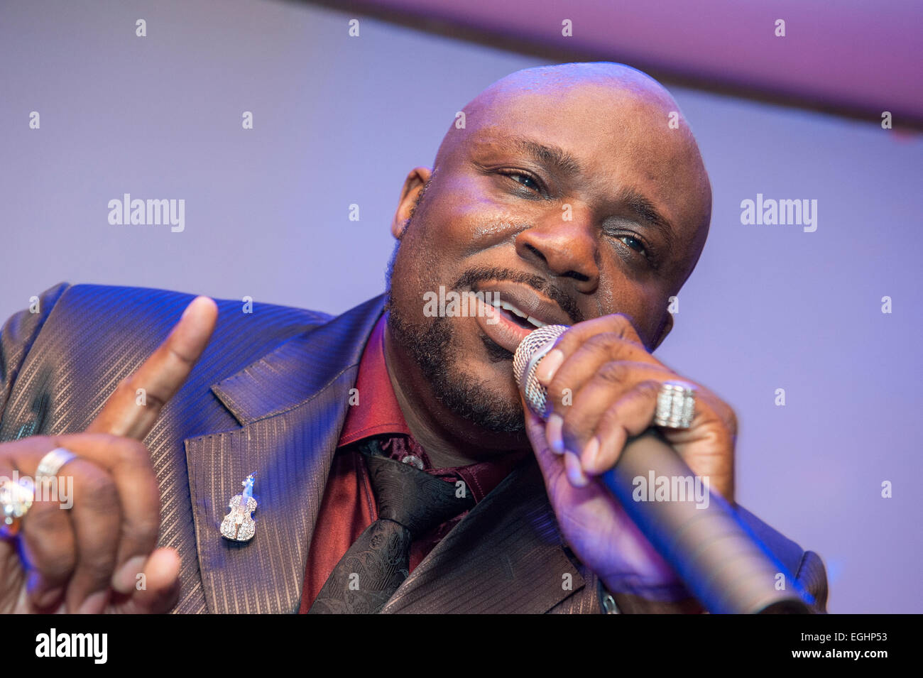 Black African male singer giving a live performance Stock Photo - Alamy