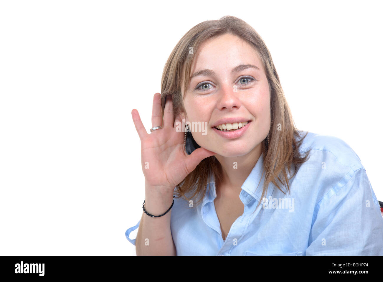 pretty young woman listen on the white background Stock Photo - Alamy