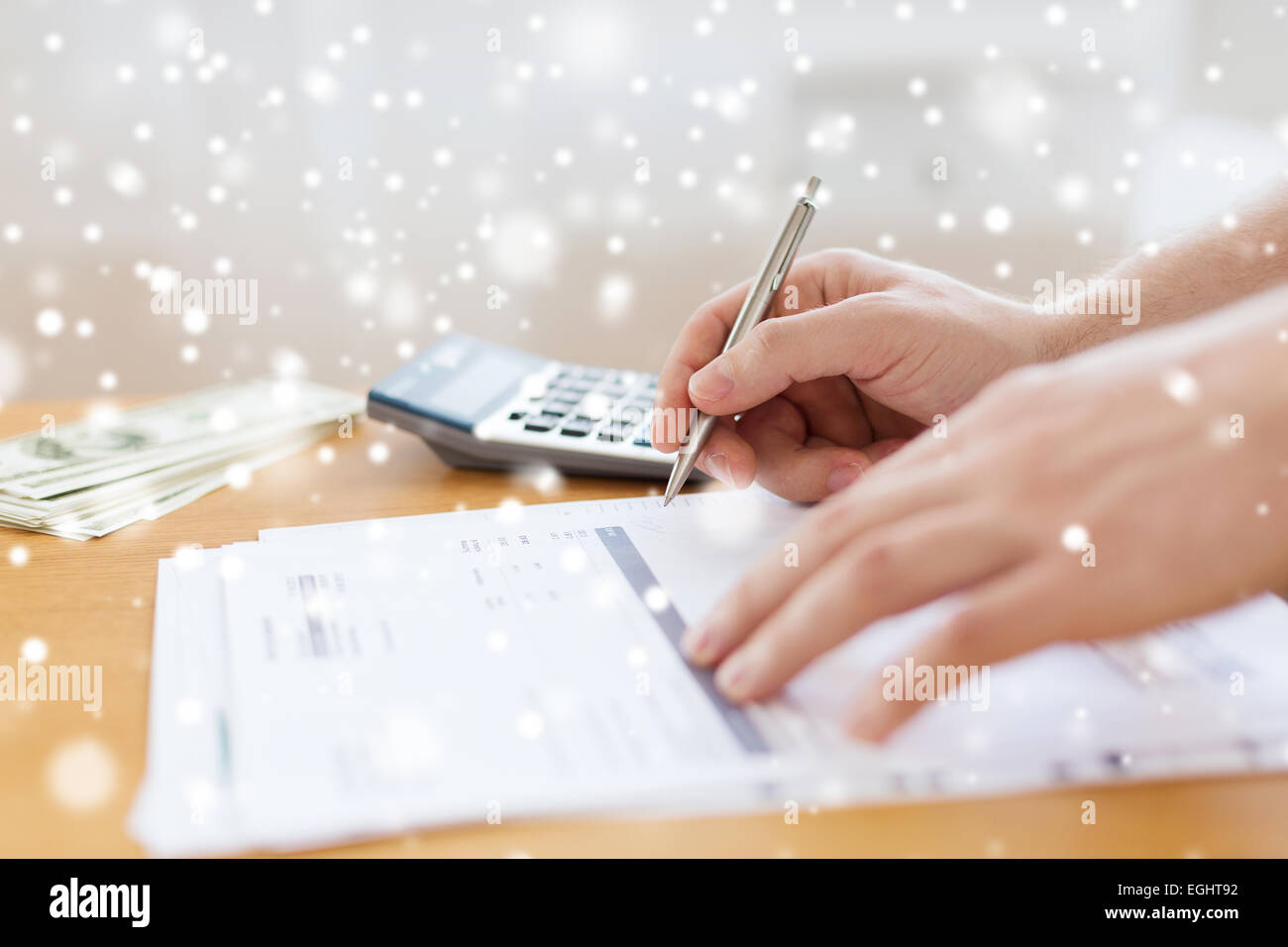 close up of man with papers doing tax report Stock Photo - Alamy