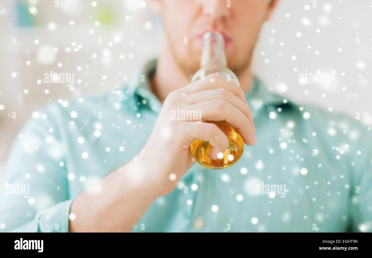 close up of man drinking beer at home Stock Photo - Alamy