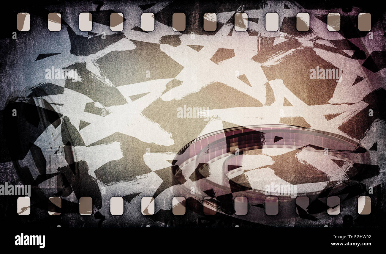 Motion picture film reel with strip and stars background Stock Photo ...