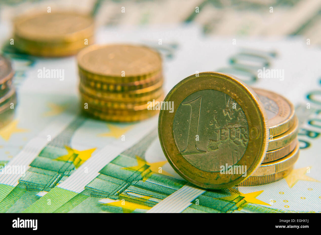 a tower of Euro coins, banknote, European currency Stock Photo - Alamy