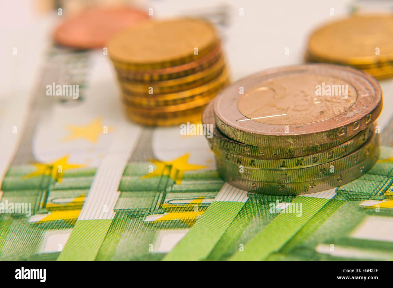 a tower of Euro coins, banknote, European currency Stock Photo - Alamy