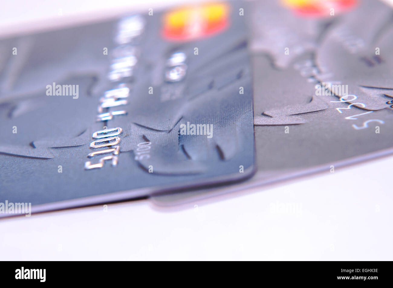 Credit cards and cash close-up on a white background Stock Photo - Alamy