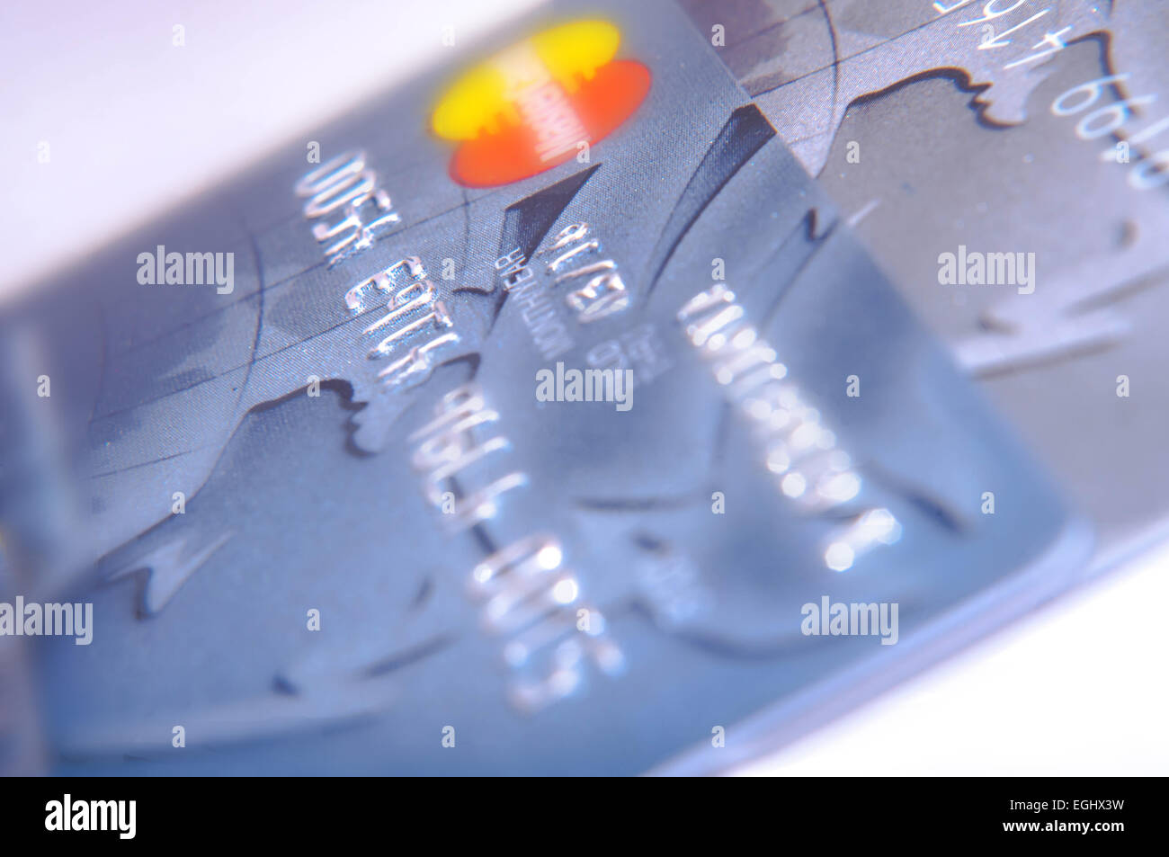 Credit cards and cash close-up on a white background Stock Photo - Alamy
