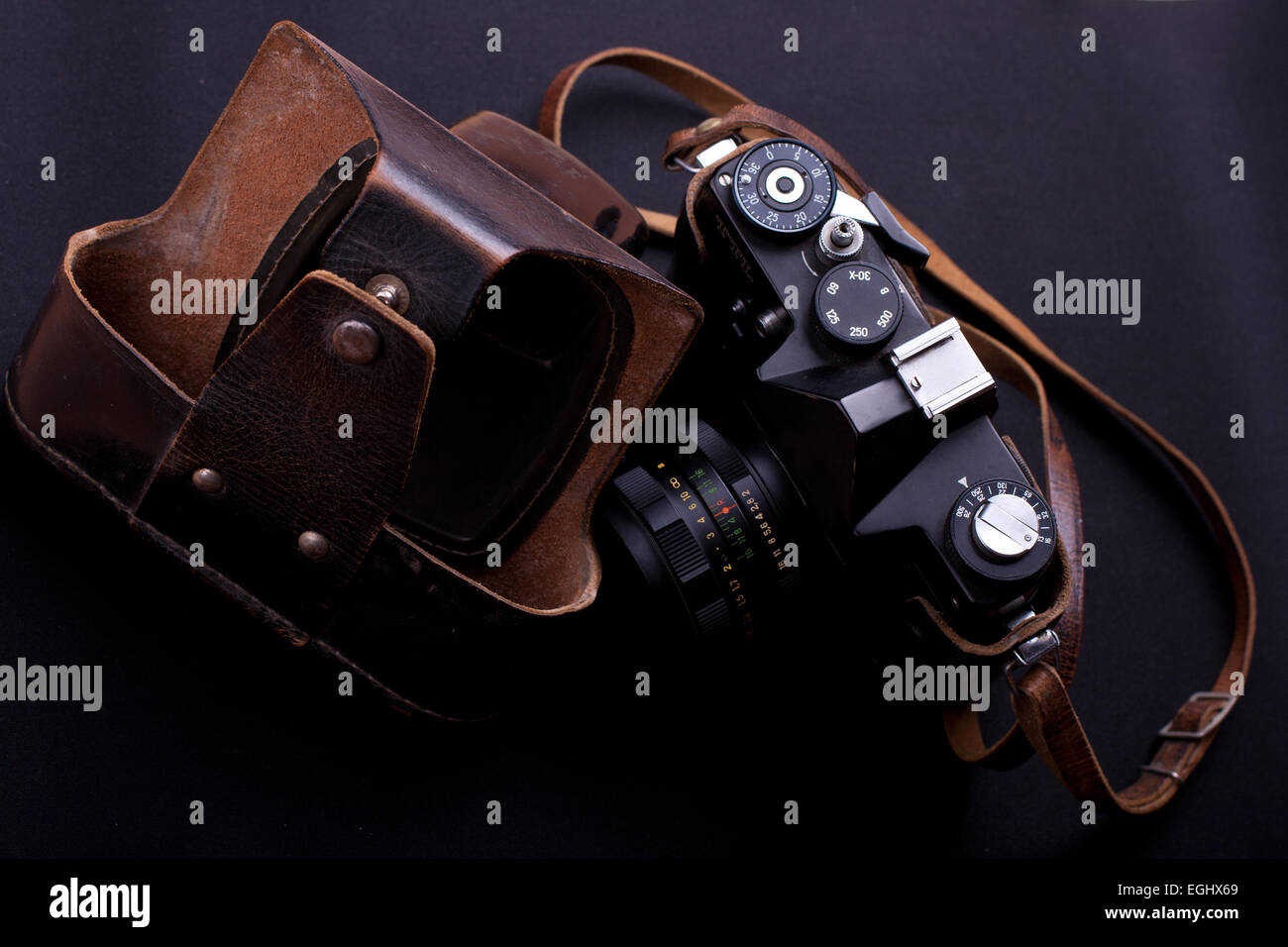 black old Soviet camera with leather pouch on black background Stock ...