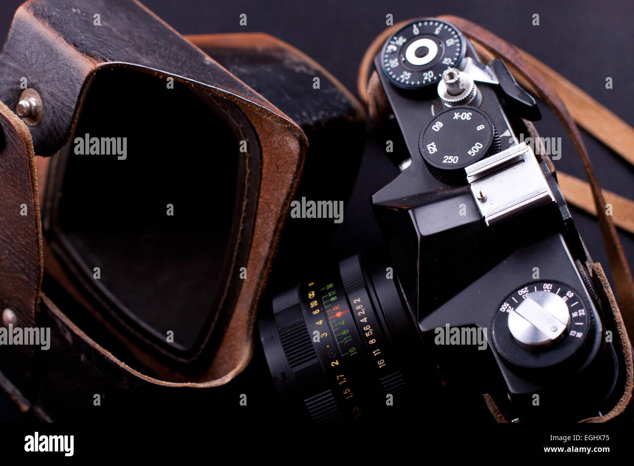 black old Soviet camera with leather pouch on black background Stock ...