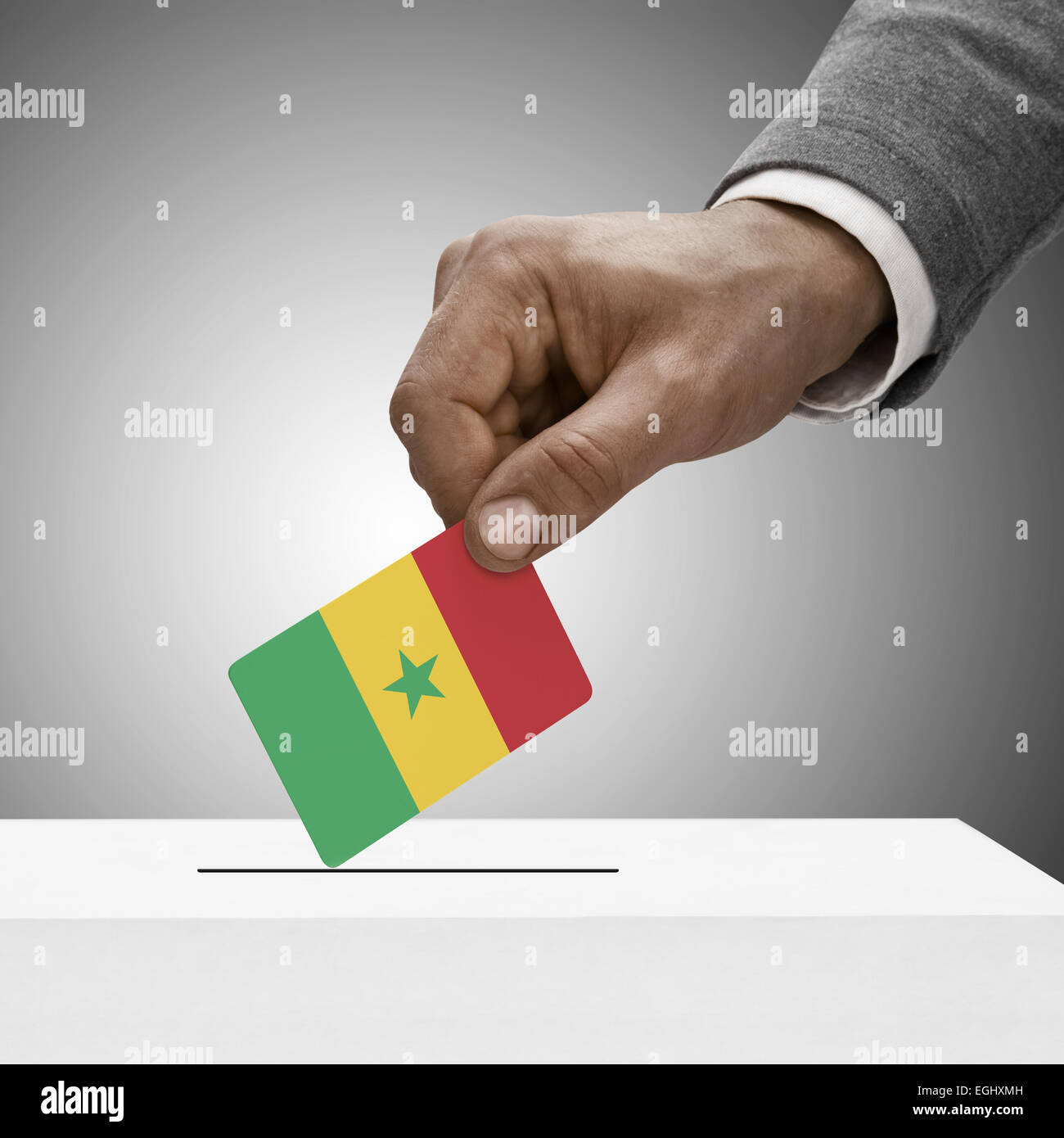 Black male holding flag. Voting concept - Senegal Stock Photo - Alamy