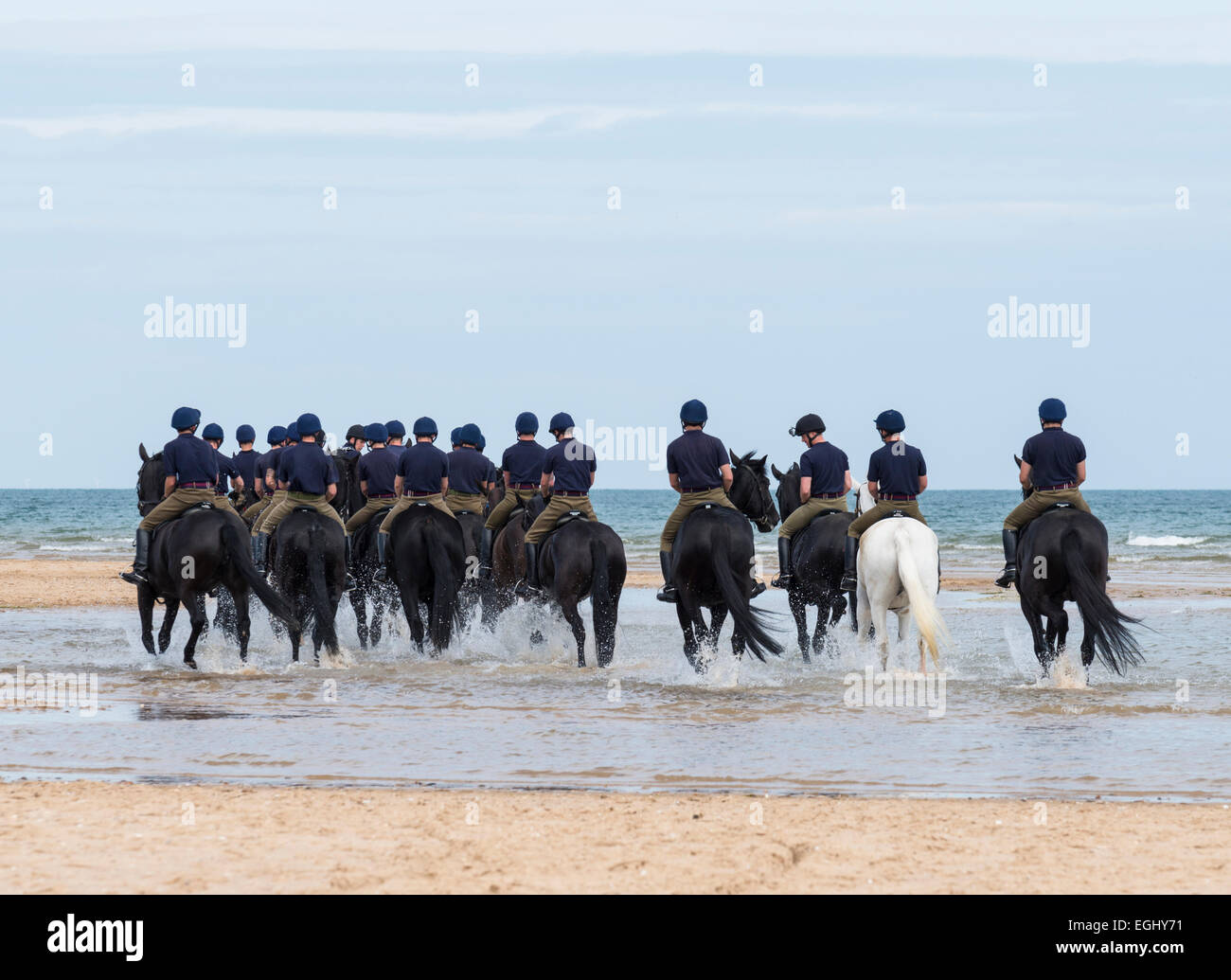 The household cavalry exercising their horses at Holkham bay, Norfolk ...