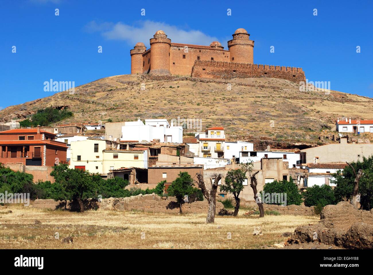 View of the castle (Castillo de La Calahorra) above the white town, La ...