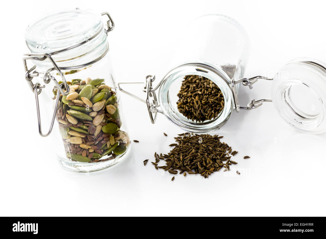 Dry seeds for baking bread in small glass jars Stock Photo - Alamy