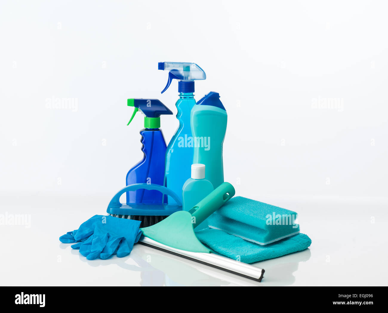 still life with cleaning supplies with different shades of blue, on ...