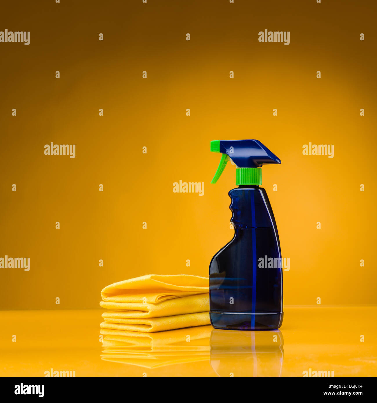 spray bottle with liquid detergent and microfiber cloth Stock Photo - Alamy