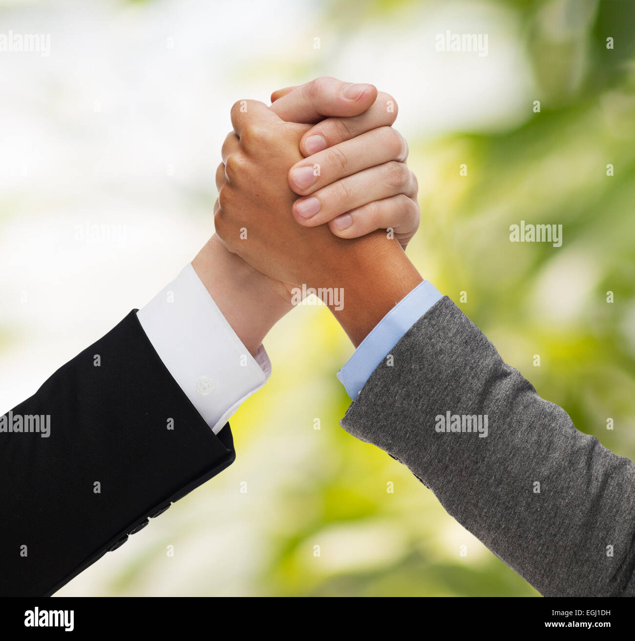 hands of two people armwrestling Stock Photo - Alamy