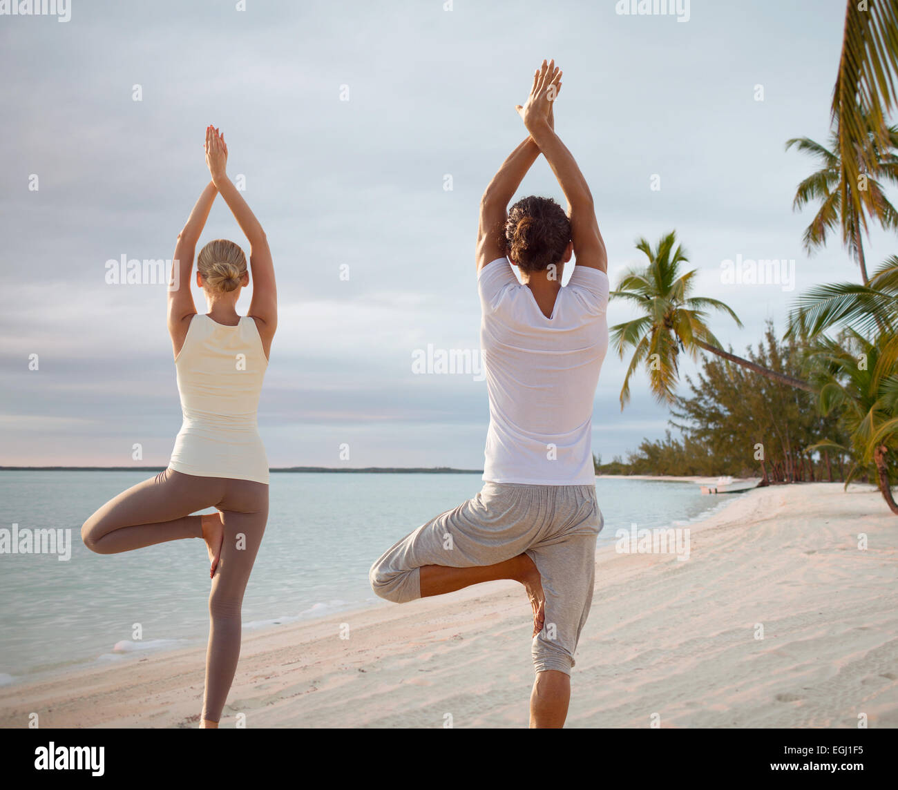Yoga beach back hi-res stock photography and images - Alamy
