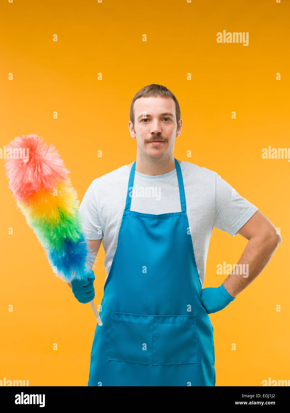 Man holding feather duster hi-res stock photography and images - Alamy