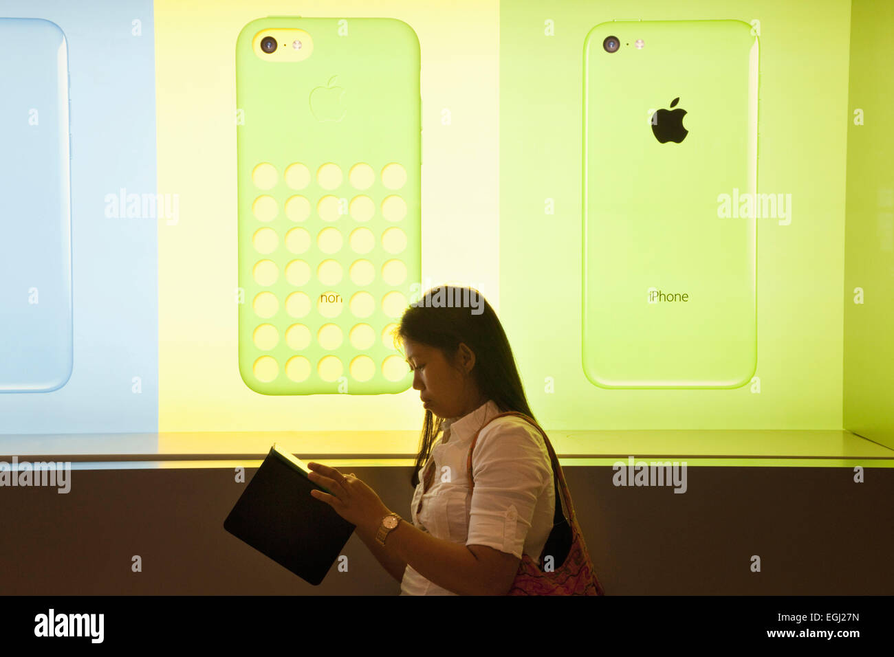China, Hong Kong, Apple Store, Window Display and Woman Looking at ...