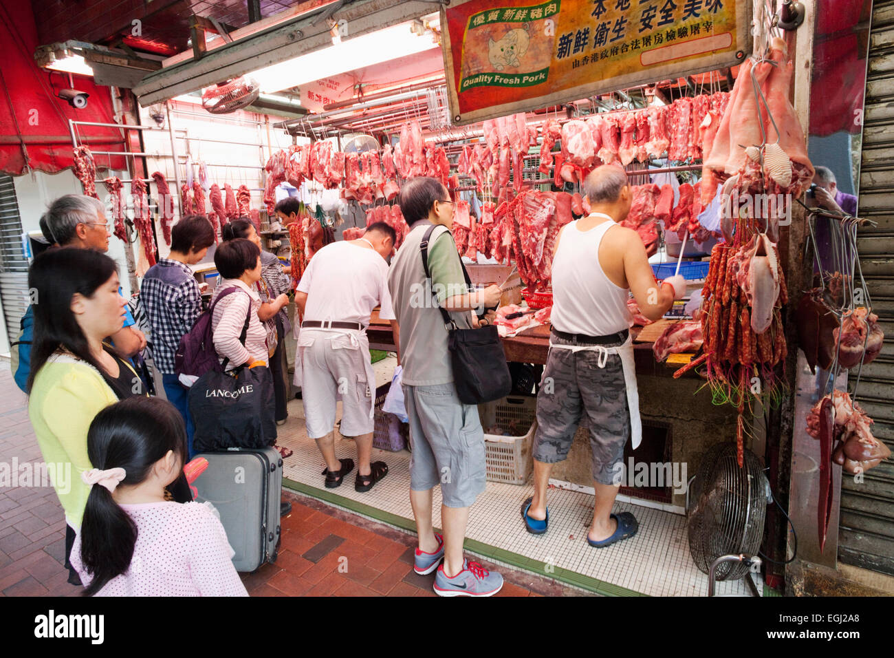 China, Hong Kong, Customers Buying Pork at Butchers Shop Stock Photo ...