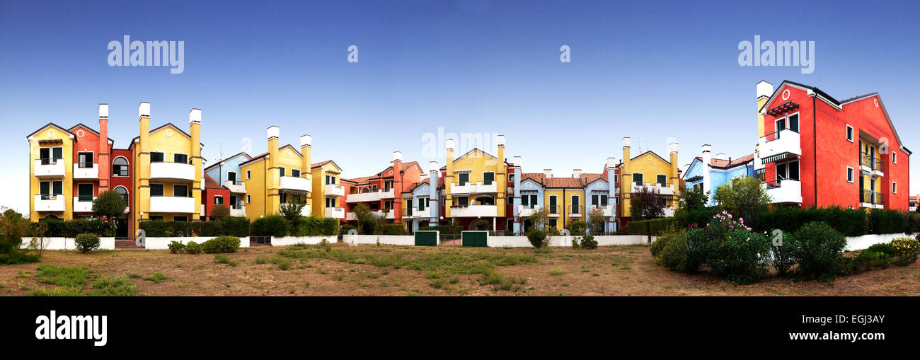 Rainbow colored houses hi-res stock photography and images - Alamy