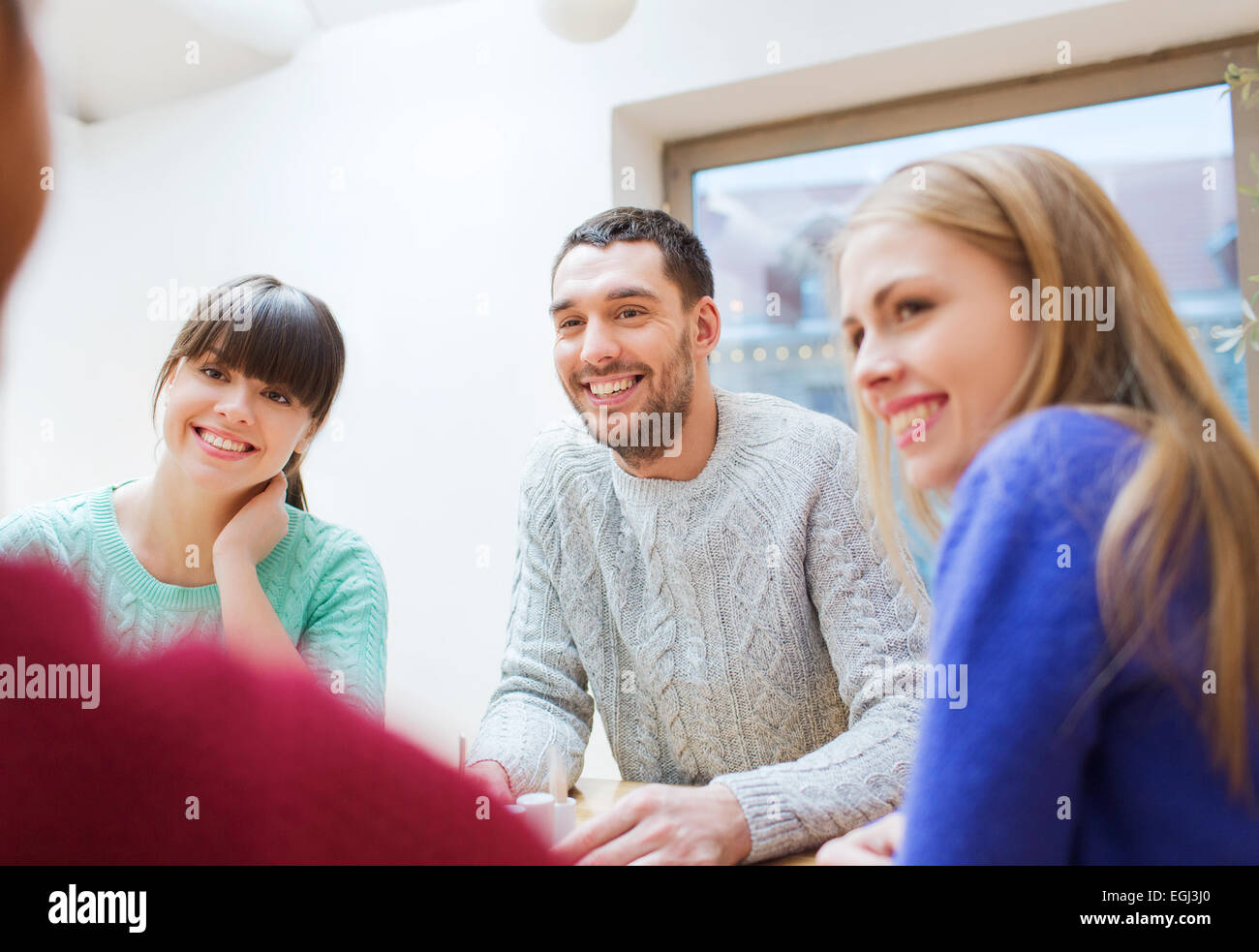 group of happy friends meeting and talking Stock Photo - Alamy