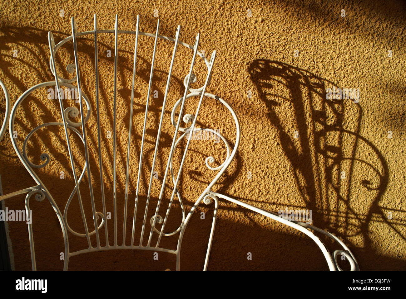 Chair casting shadow hi-res stock photography and images - Alamy