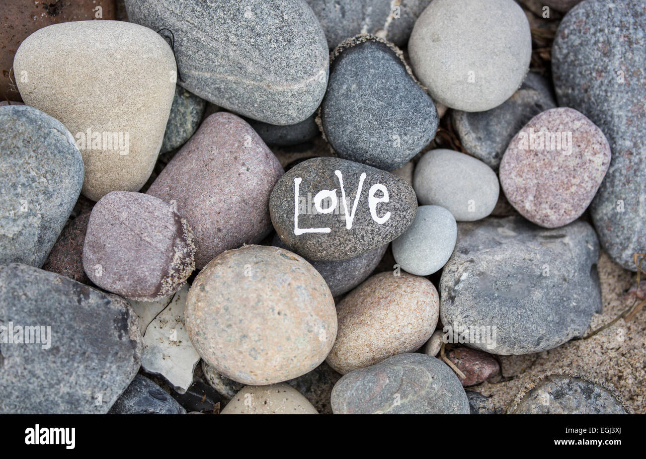 Stones, pebble stone with lettering Love Stock Photo - Alamy