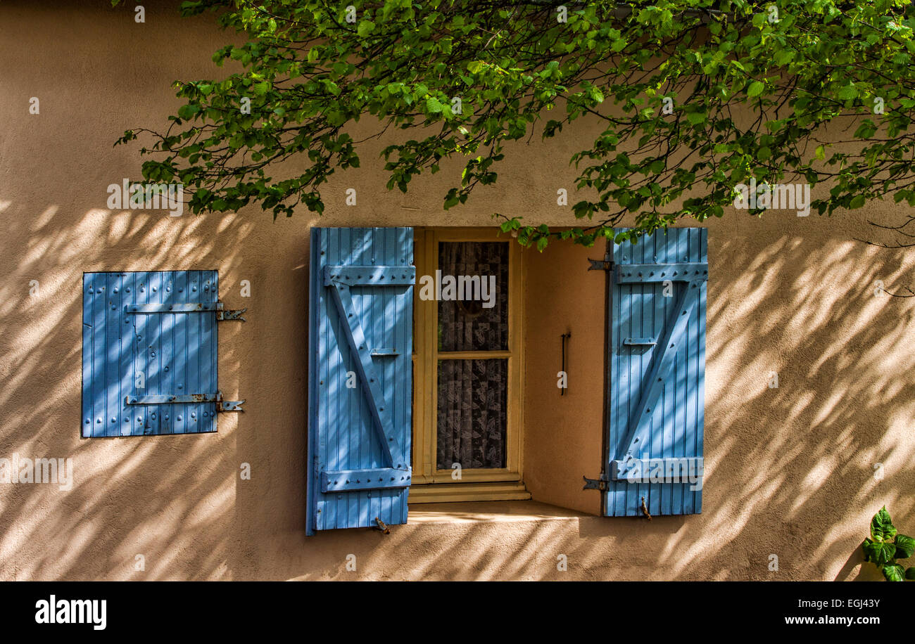 Blue window shutters france hi-res stock photography and images - Alamy