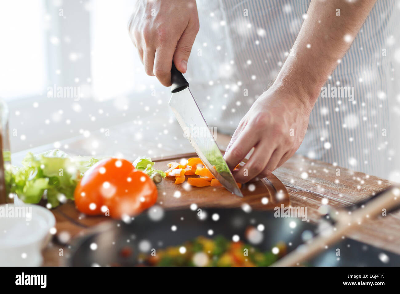 close up of man cutting vegetables with knife Stock Photo - Alamy