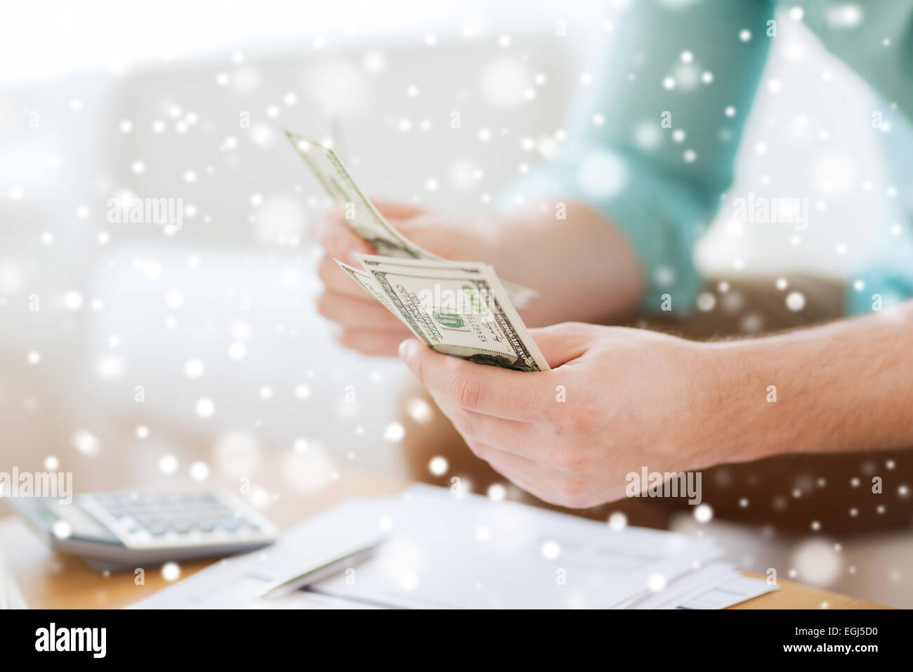 close up of man counting money and making notes Stock Photo - Alamy