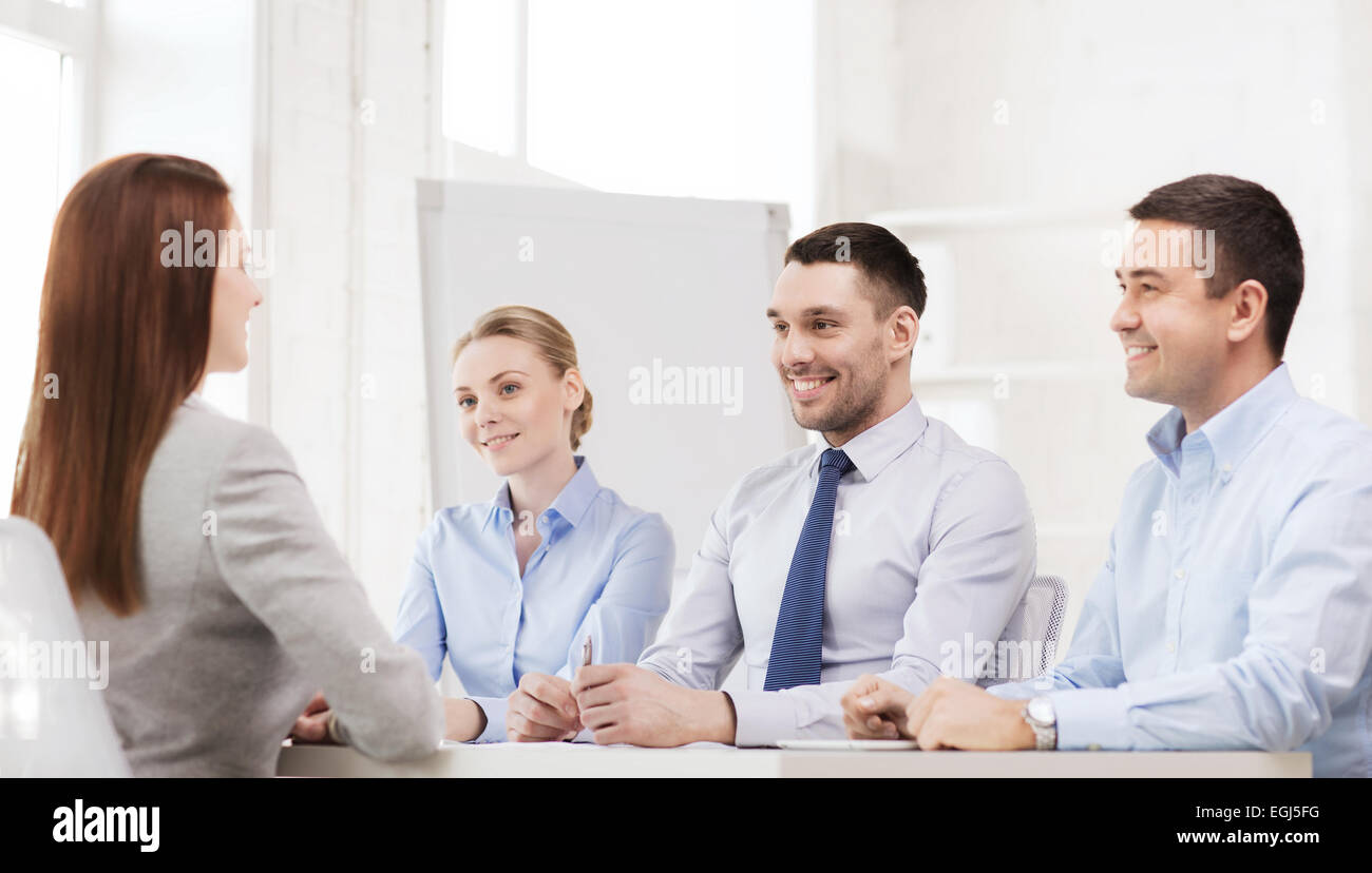 smiling businesswoman at interview in office Stock Photo - Alamy