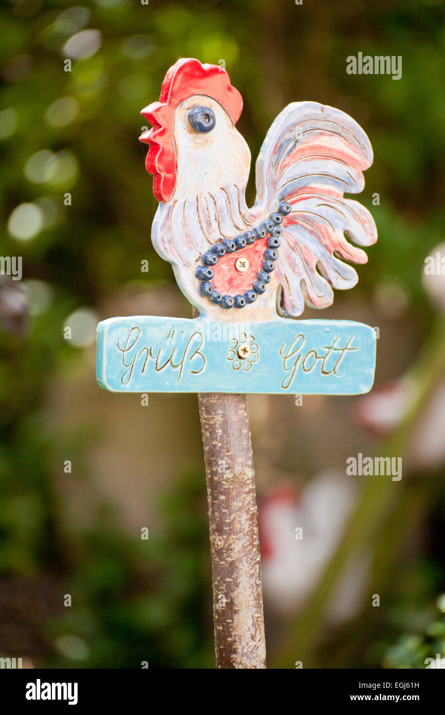Figure of a rooster, sign, Hello Stock Photo - Alamy