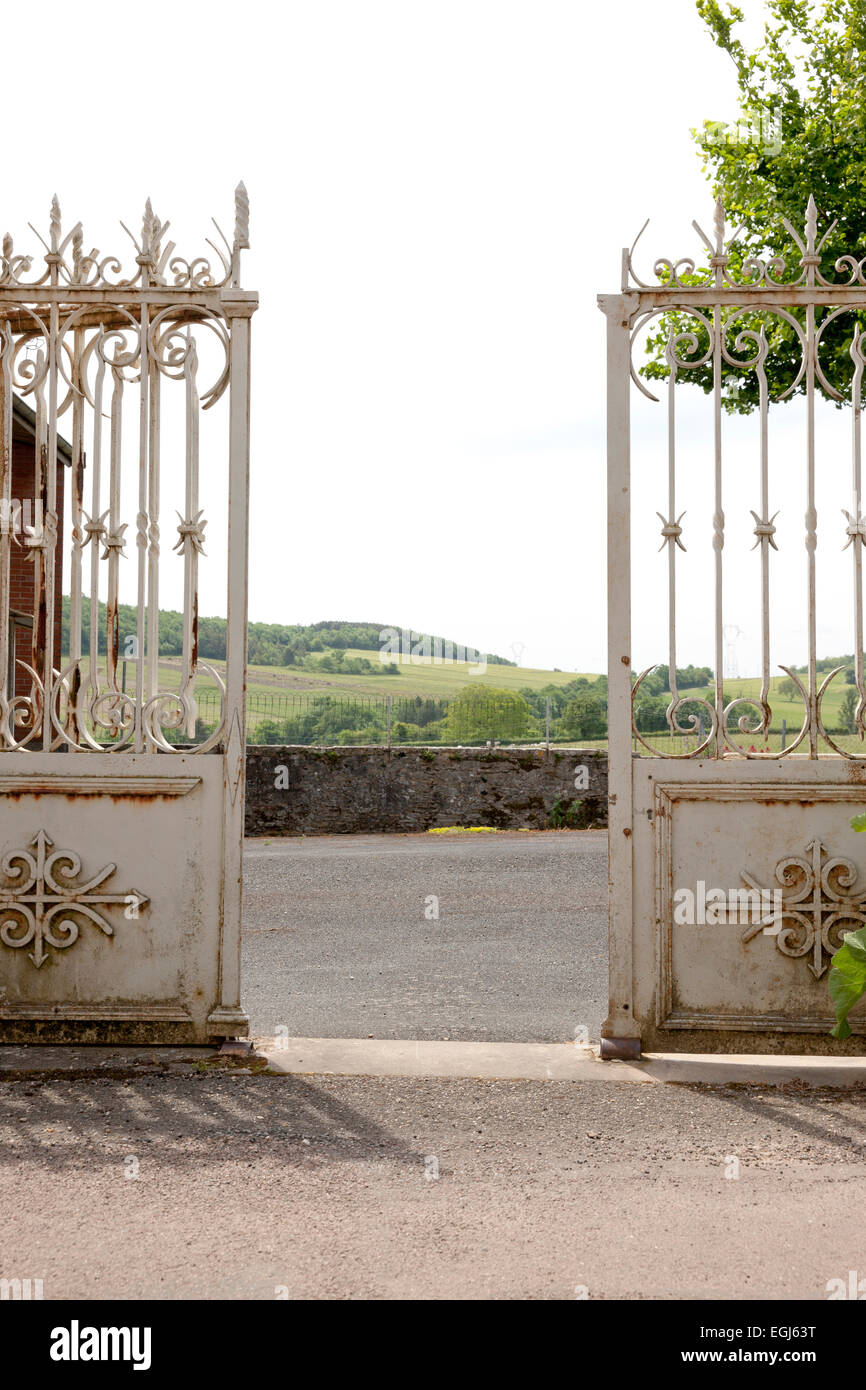 Open white gate Stock Photo - Alamy