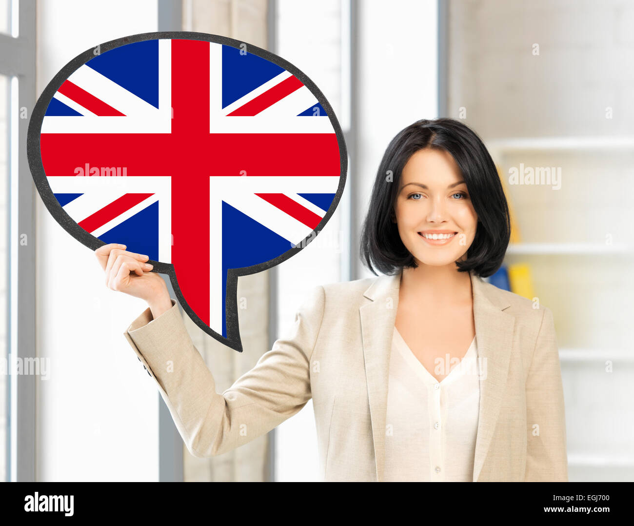 smiling woman with text bubble of british flag Stock Photo - Alamy